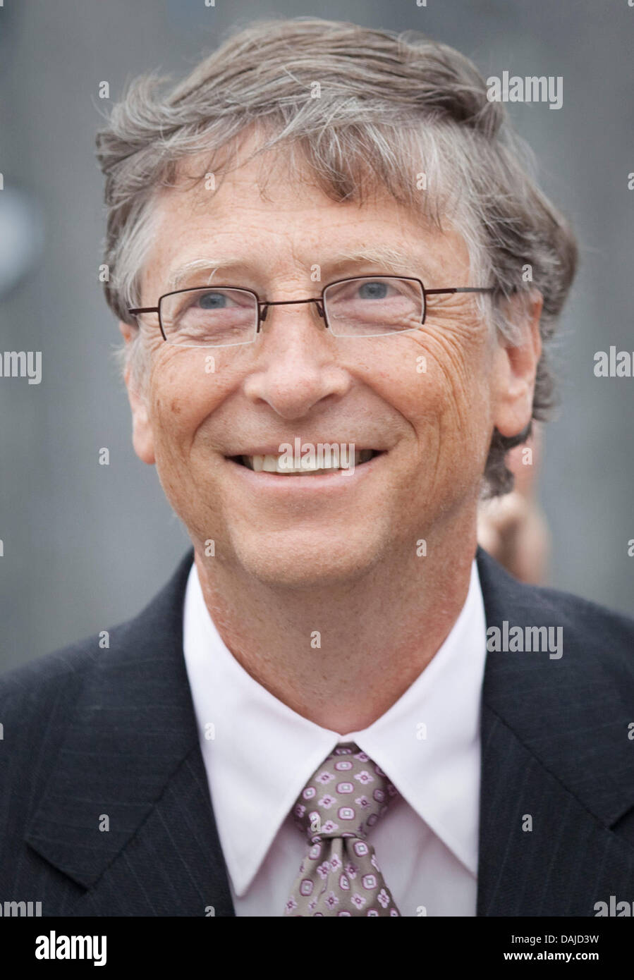 Microsoft founder Bill Gates poses in front of the Brandenburg Gate in ...
