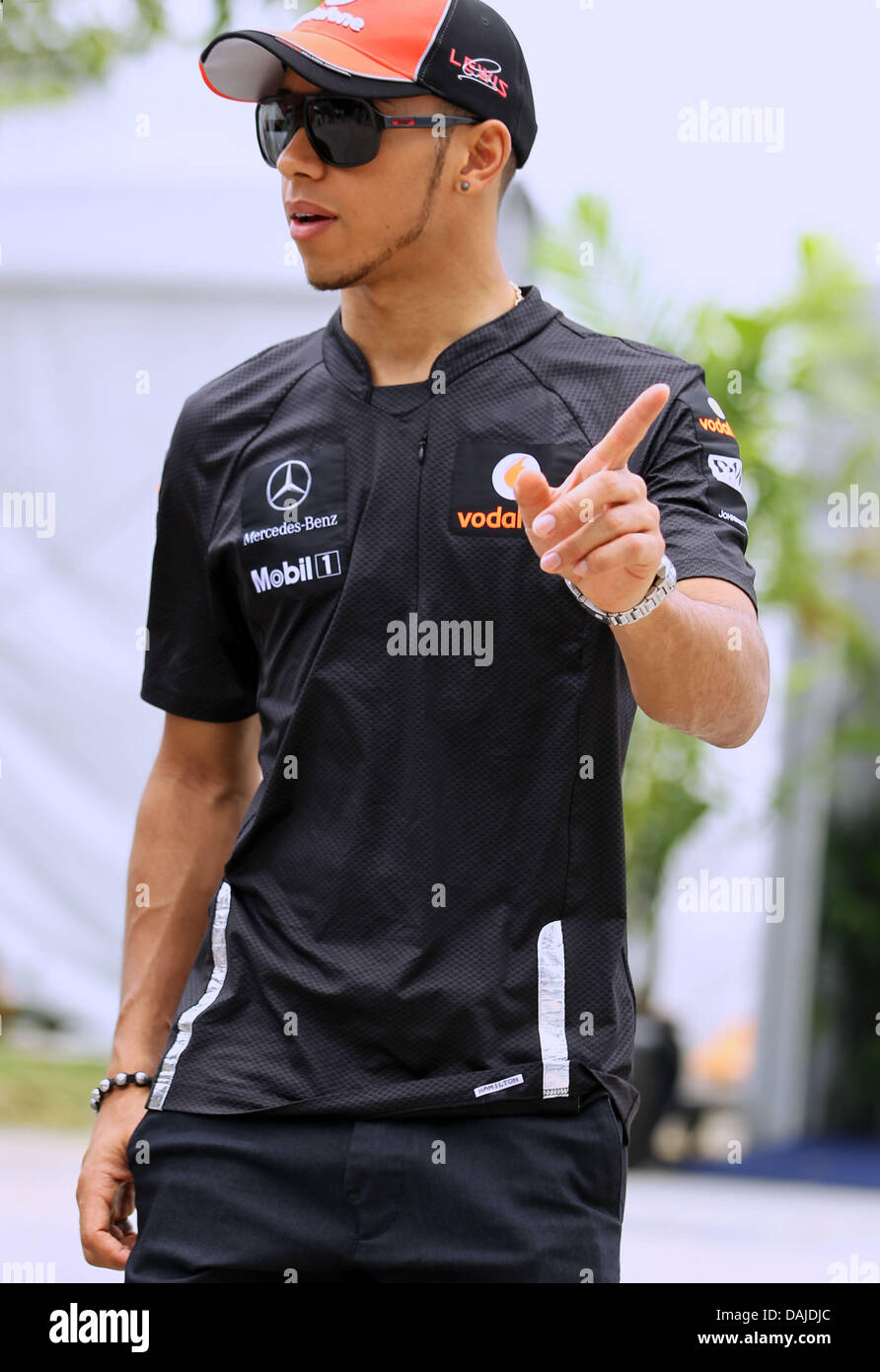 British Formula One driver Lewis Hamilton of McLaren Mercedes arrives ...