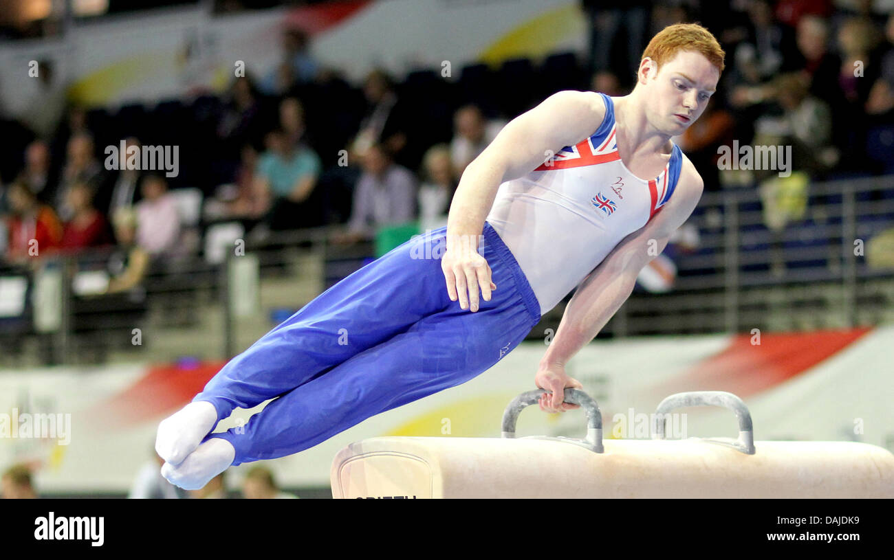 Daniel Purvis from Great Britain performs an exercise on the vault ...
