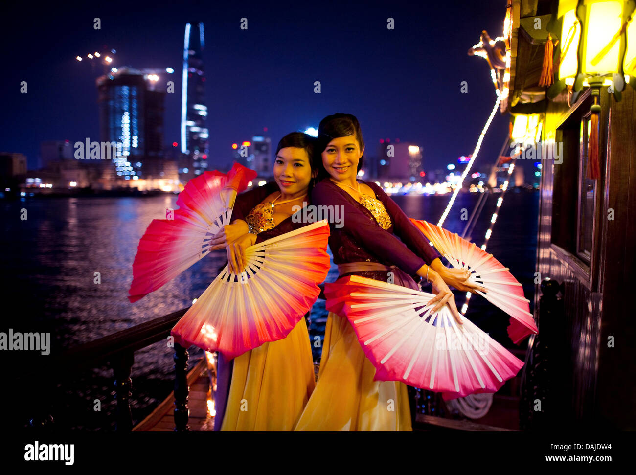 The two Vietnamese dancers Nguyet (L) and Mai perform a traditional ...