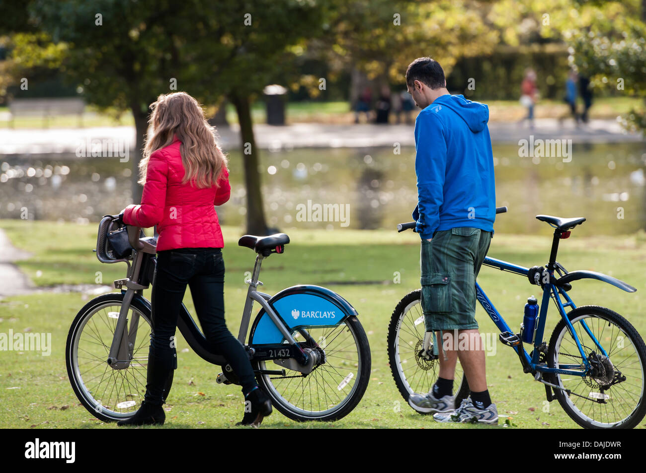 Two walking cyclists hi-res stock photography and images - Alamy