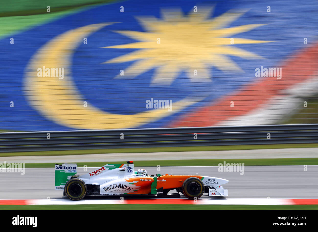 German Formula One driver Adrian Sutil of Force India steers his car in ...