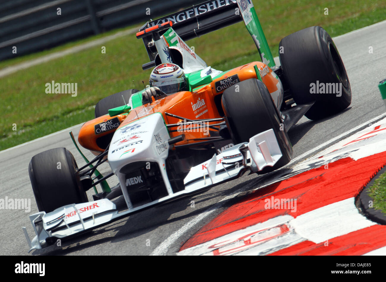 German Formula One driver Adrian Sutil of Force India steers his car ...