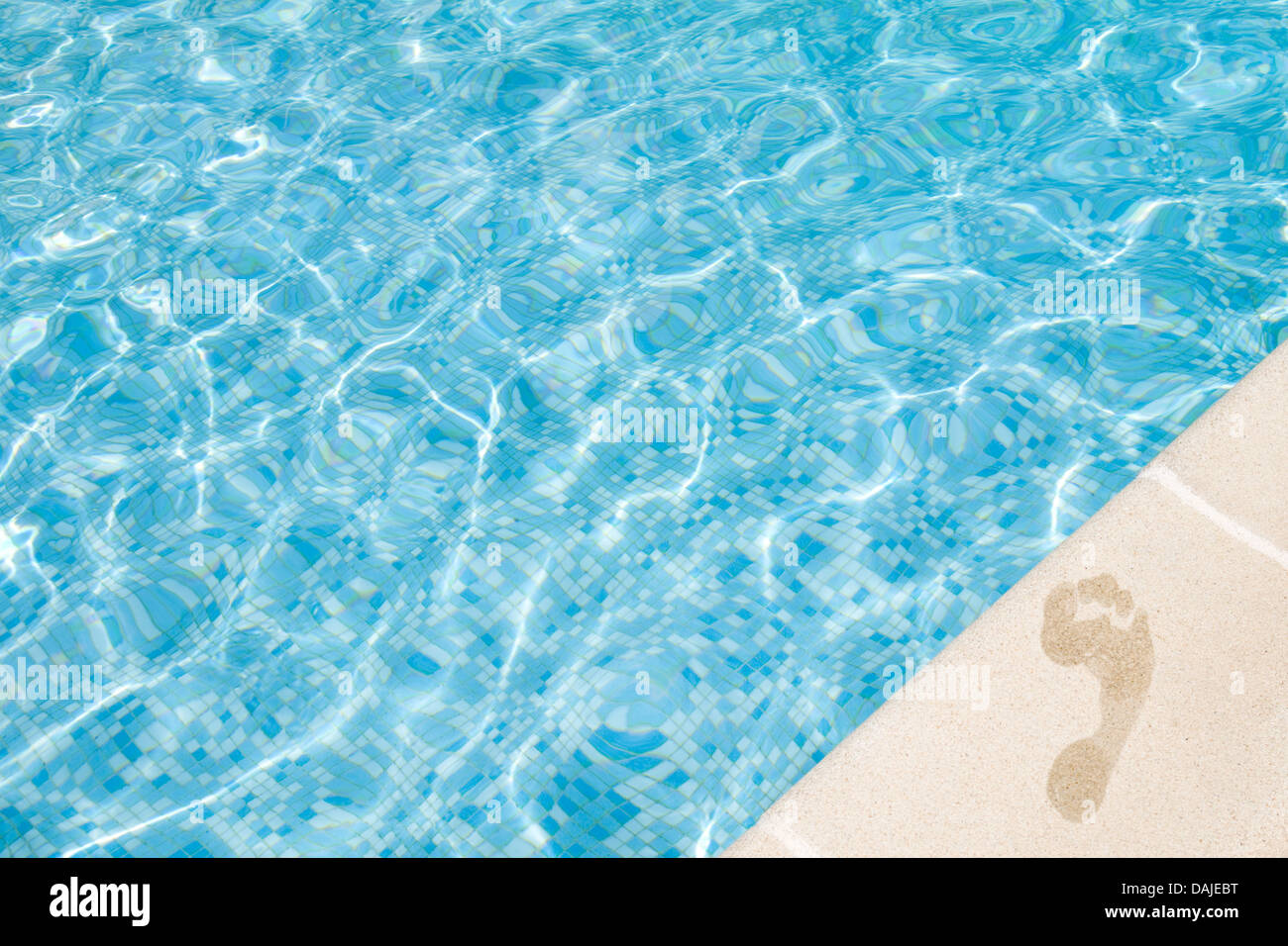 footprint on pool shore Stock Photo - Alamy