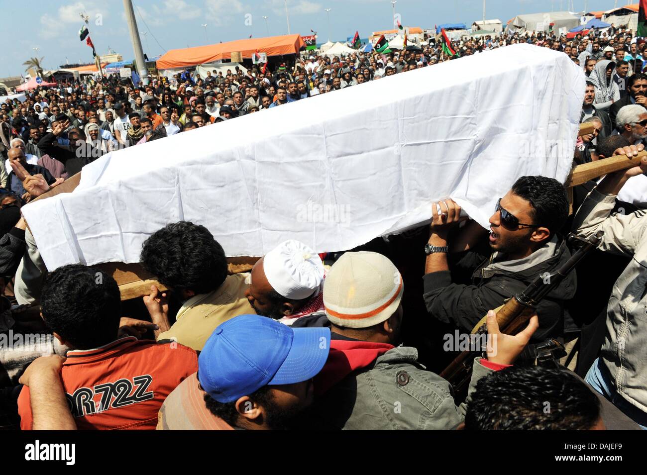 Thousands of people take part in Friday prayers and funeral services ...