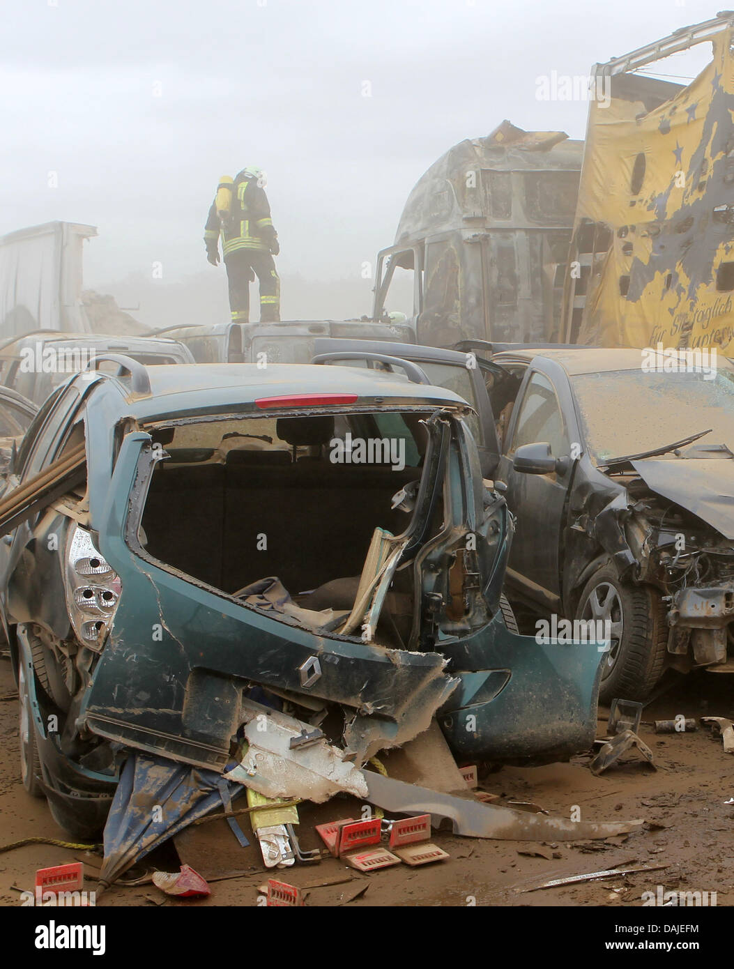 Firemen are in operation at a multiple car pile-up on Autobahn A19 in ...