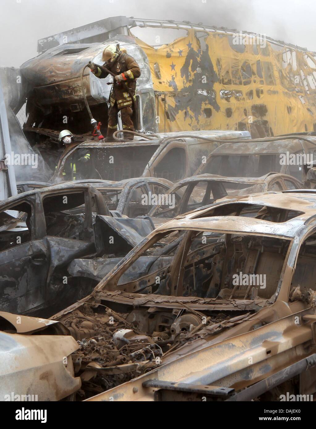 Firemen are in operation at a multiple car pile-up on Autobahn A19 in ...