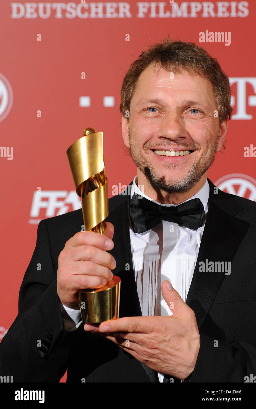 German actor Richy Mueller poses with the Lola award during the ...