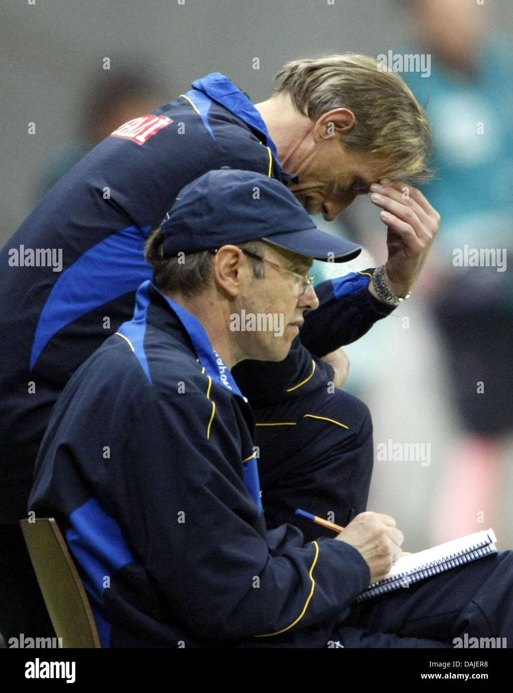 Frankfurt's head coach Christoph Daum (top) and his assistant Roland ...