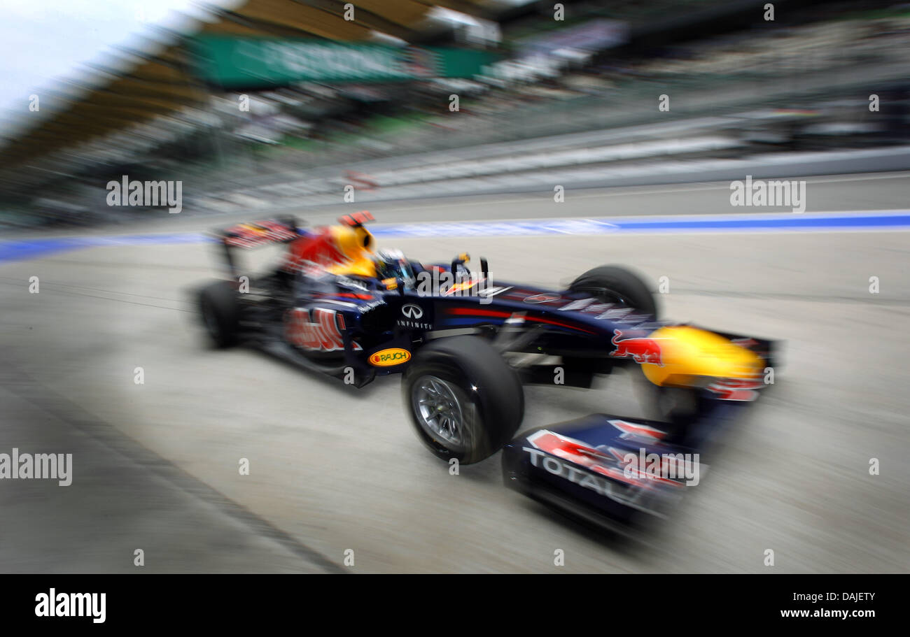 German Formula One driver Sebastian Vettel of Red Bull drives his ...