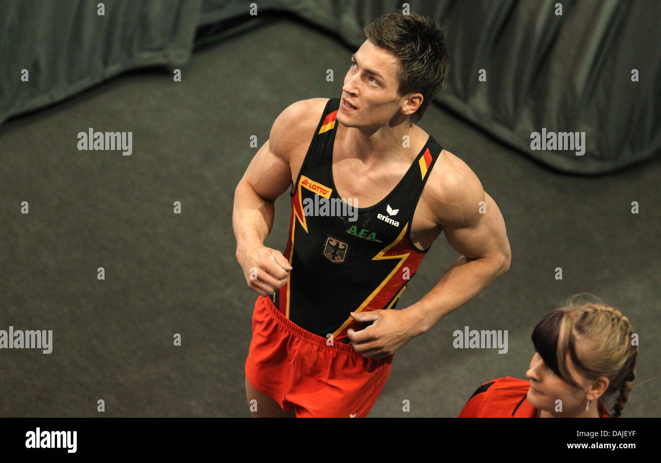 The German Philipp Boy looks to the display panel after his performance ...