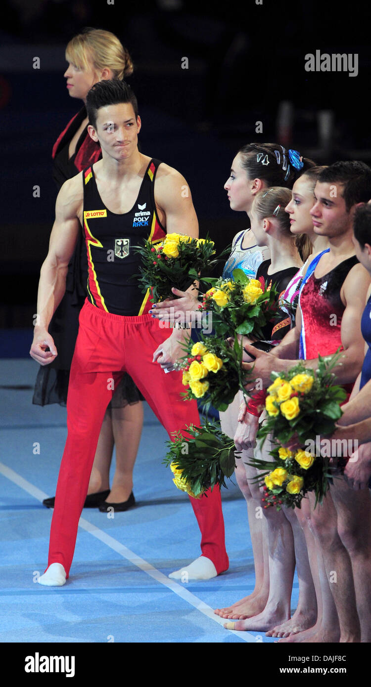 German gymnast Marcel Nguyen celebrates winning the beam final of the ...