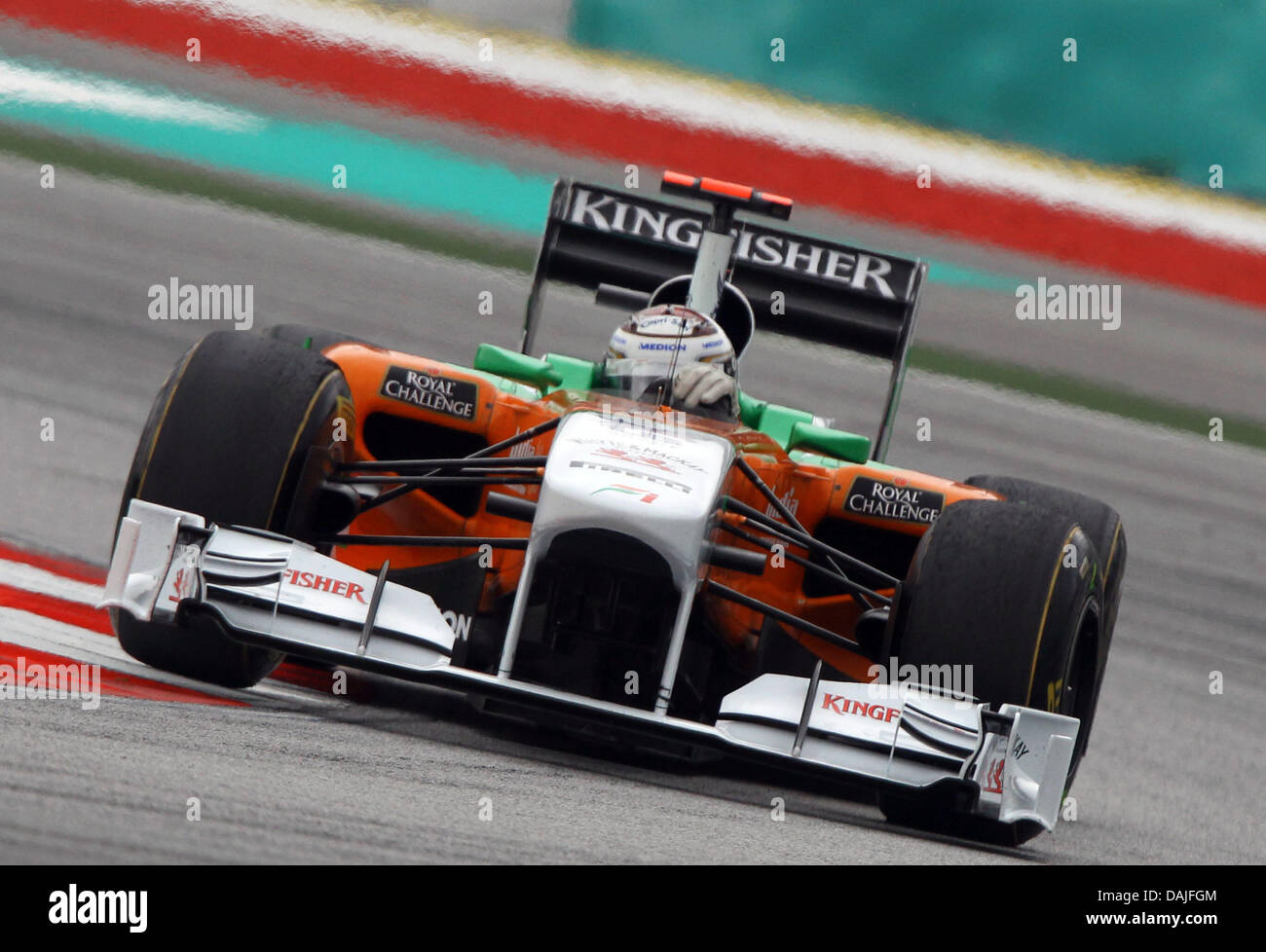 German Formula One driver Adrian Sutil of Force India steers his car ...