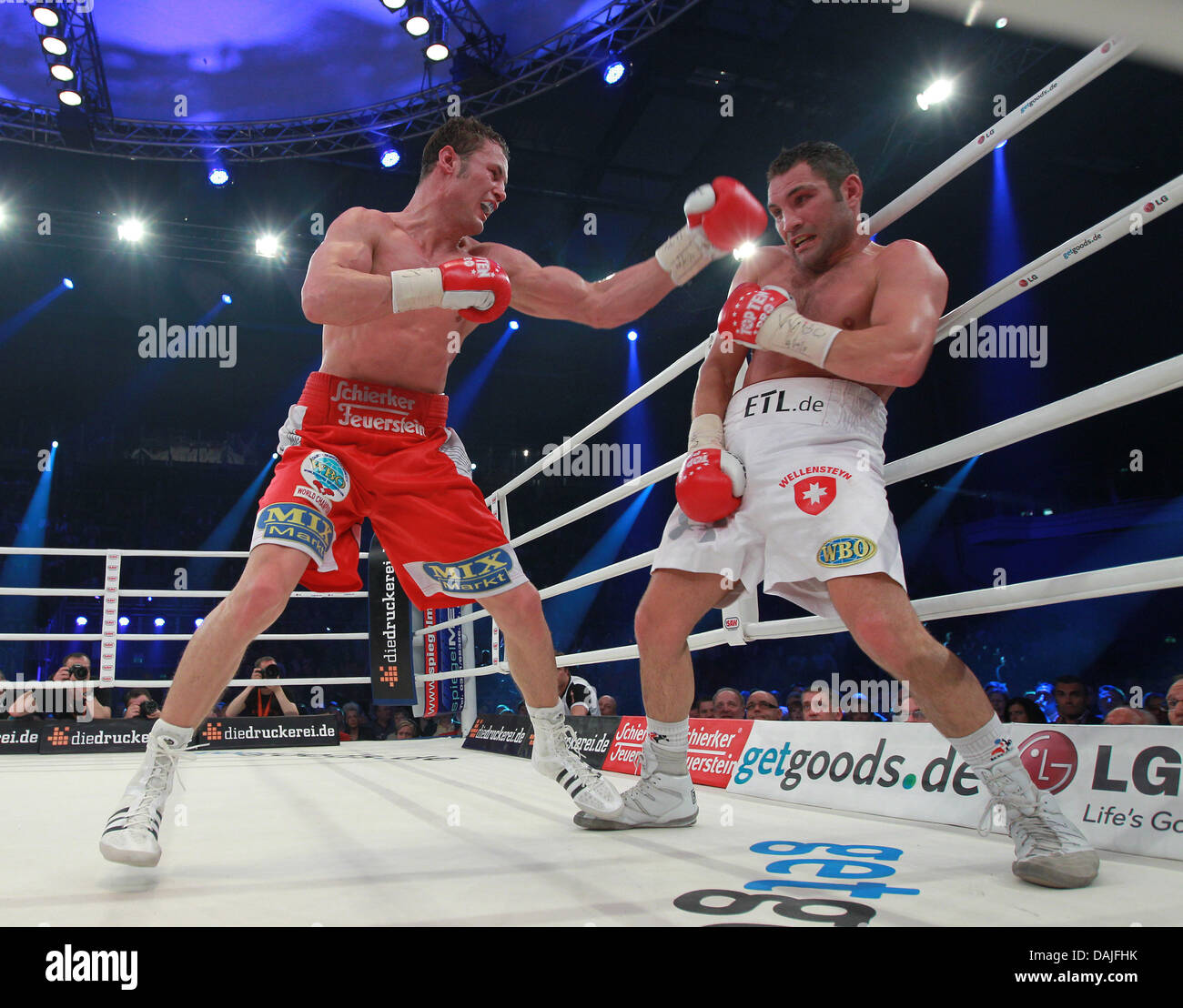 German boxer Robert Stieglitz (L) fights Armenia's Khoren Gevor for the ...