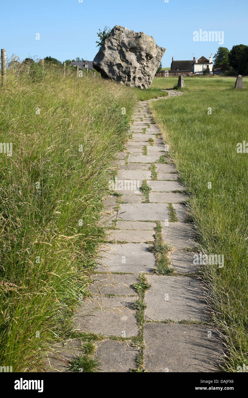 Pathway leading to The Swindon Stone at Avebury Stock Photo - Alamy