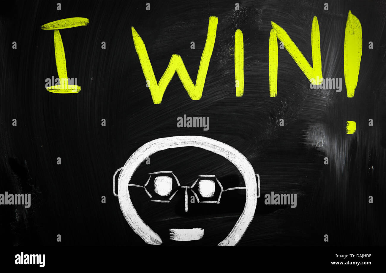 Win handwritten with white chalk on a blackboard Stock Photo - Alamy