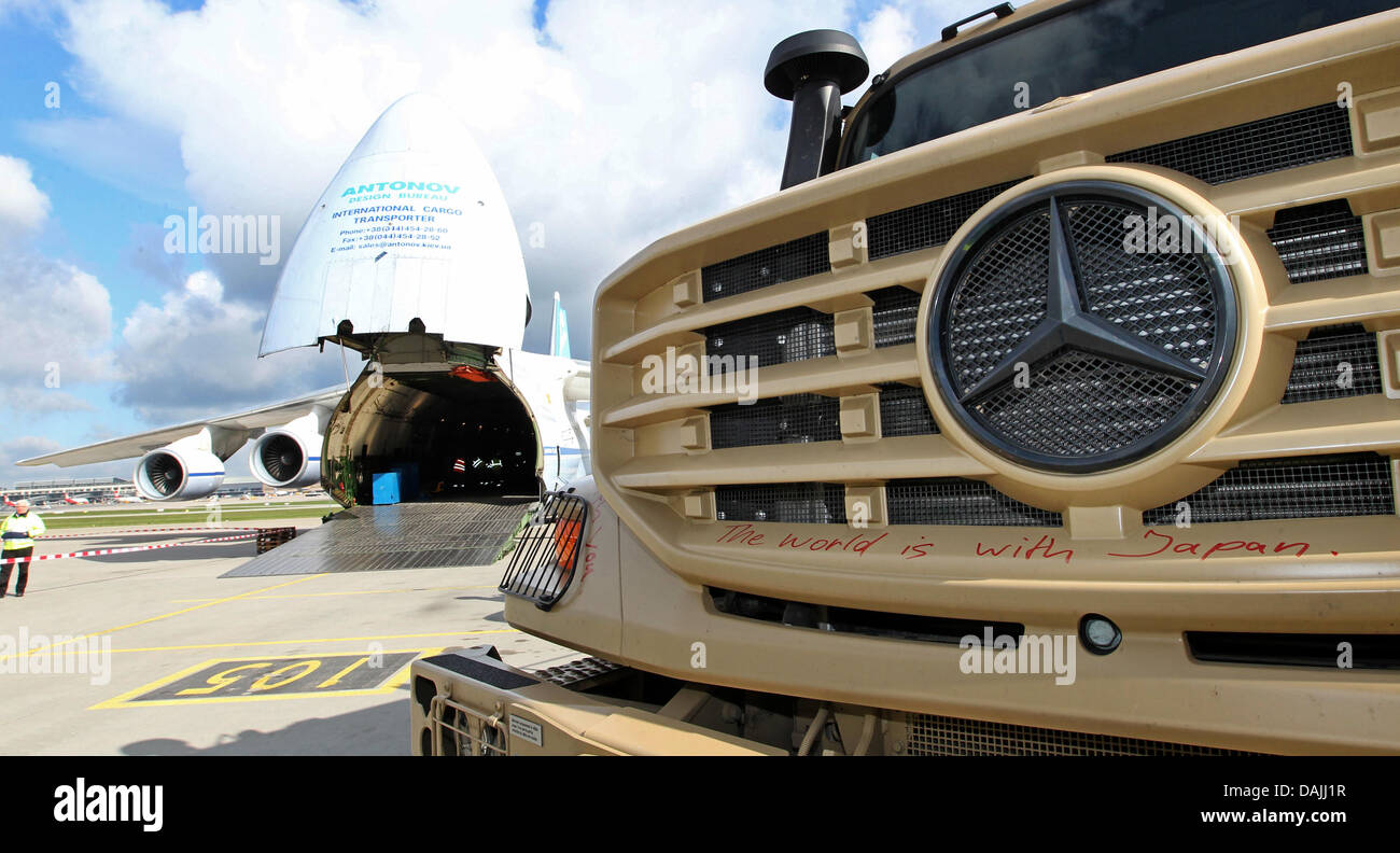 An Antonov 124 is loaded with vehicles of the car company Daimler, that ...