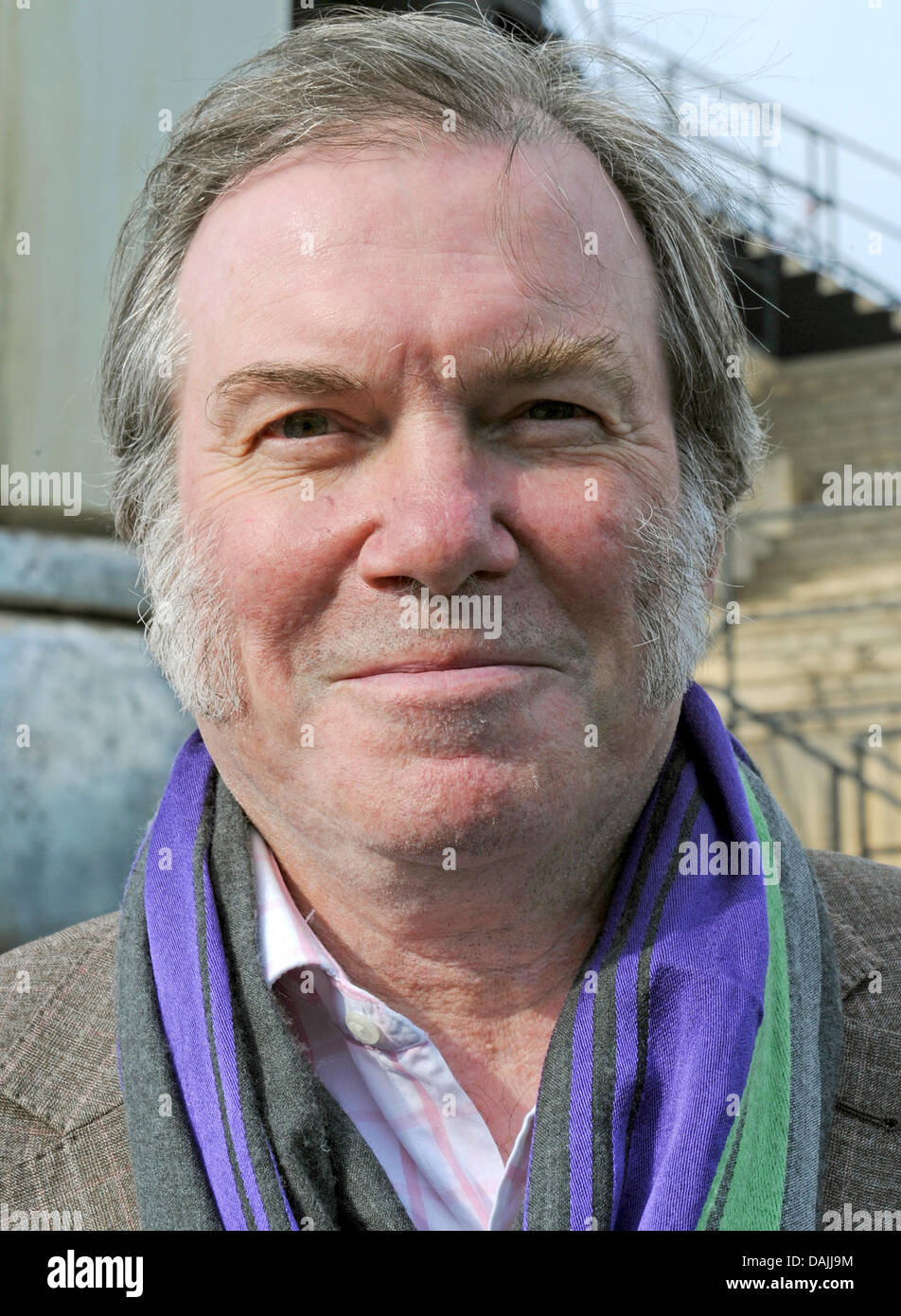 The director David Pountney stands in front of the scenery for the ...