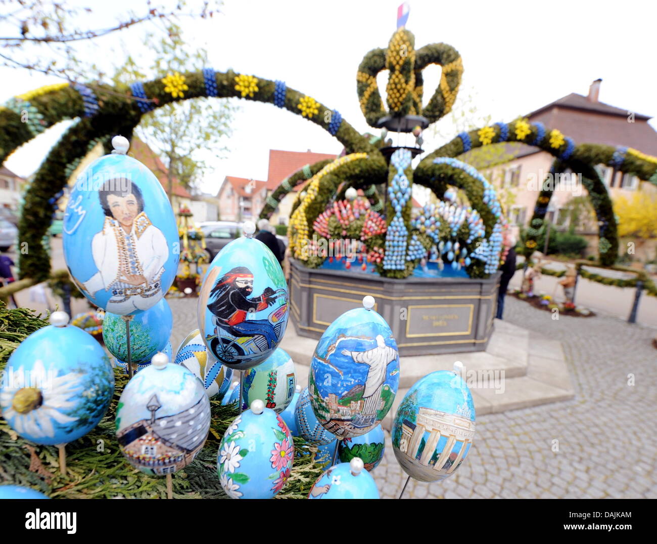 Around 9500 colorfully painted eggs adorn the Easter Well in ...