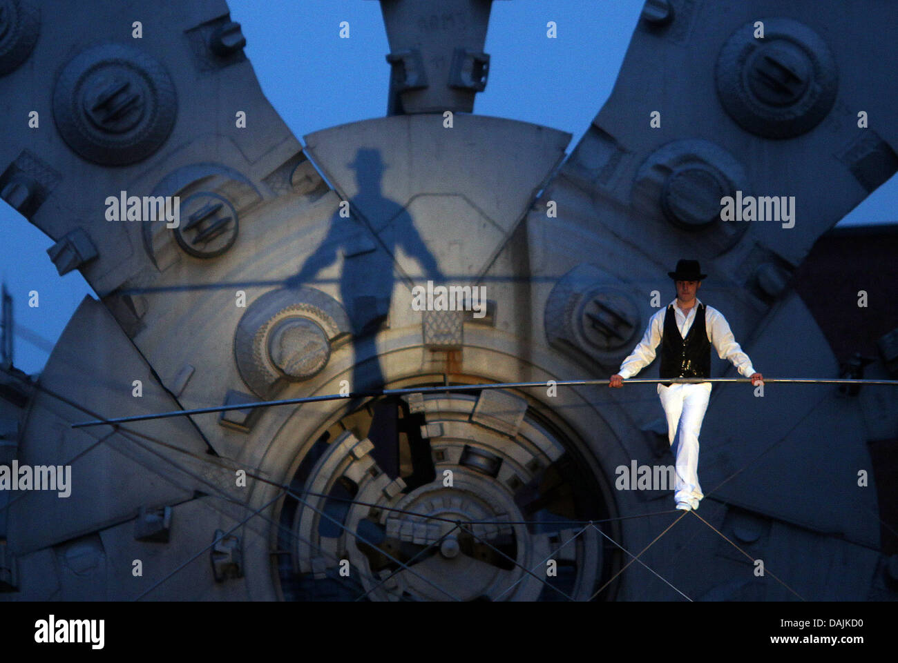 High-wire artist Jack Traber blances in front of the tunnelling machine ...