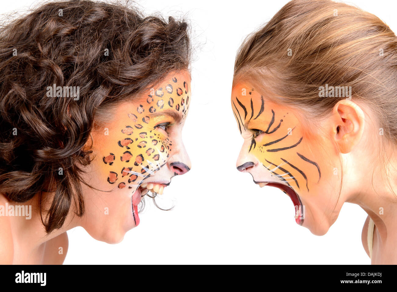 Beautiful young girls with feline painted faces, tiger and leopard ...