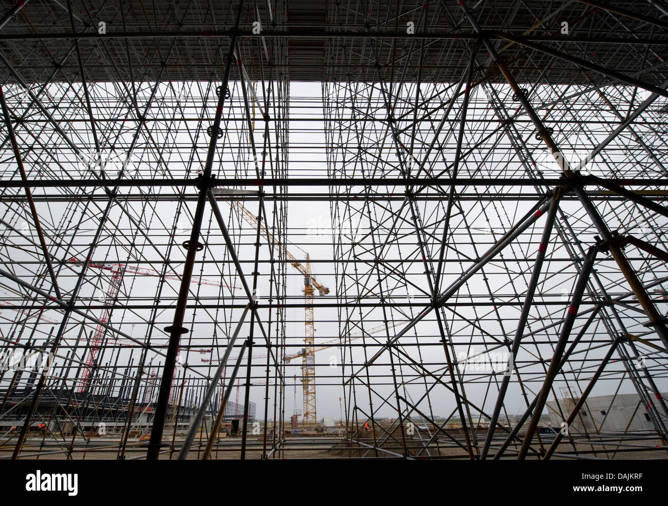 Cranes and scaffolding are pictured at the construction site of the ...