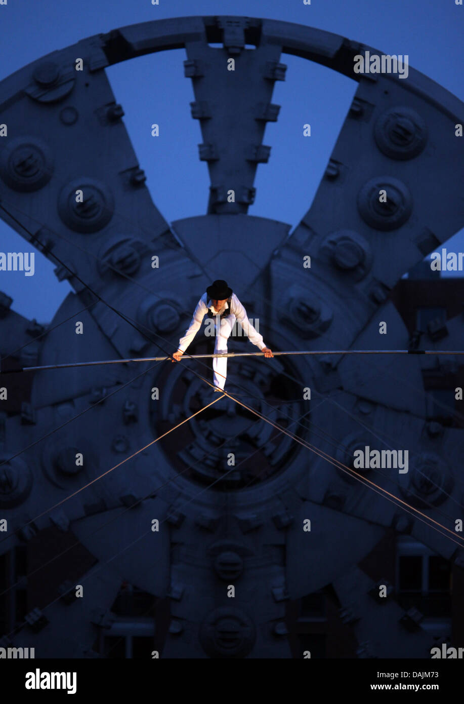 High-wire artist Jack Traber blances in front of the tunnelling machine ...