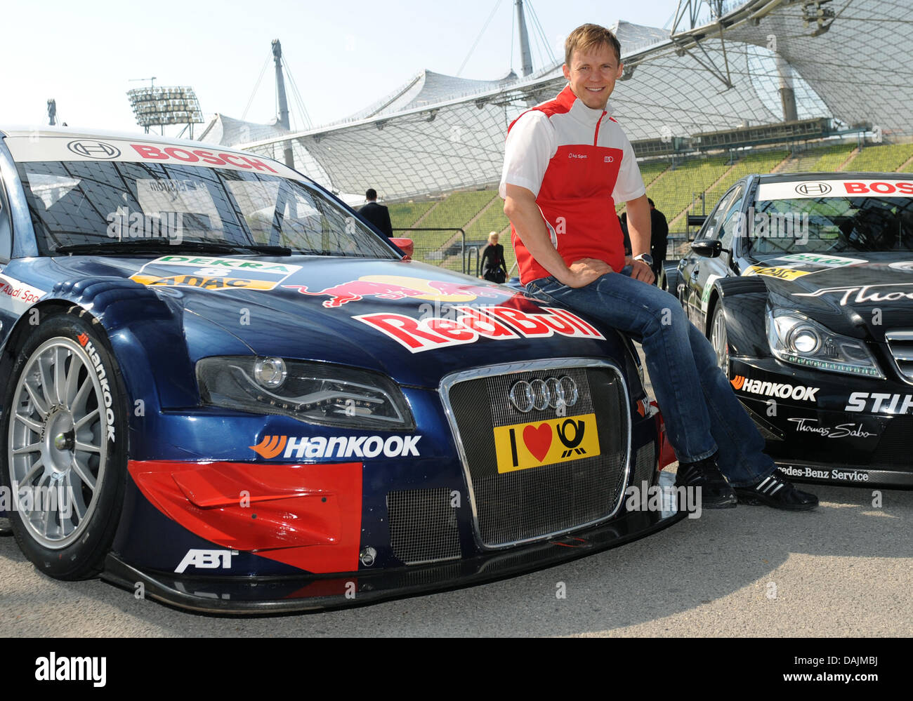 DTM race driver Mattias Ekstroem poses at the olympic stadium in Munich ...