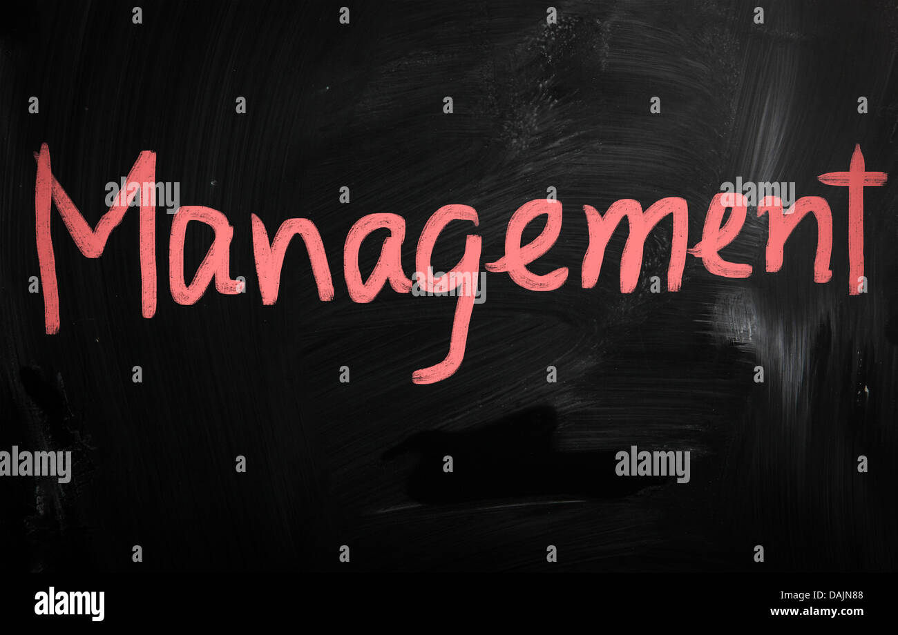 Management handwritten with white chalk on a blackboard Stock Photo - Alamy