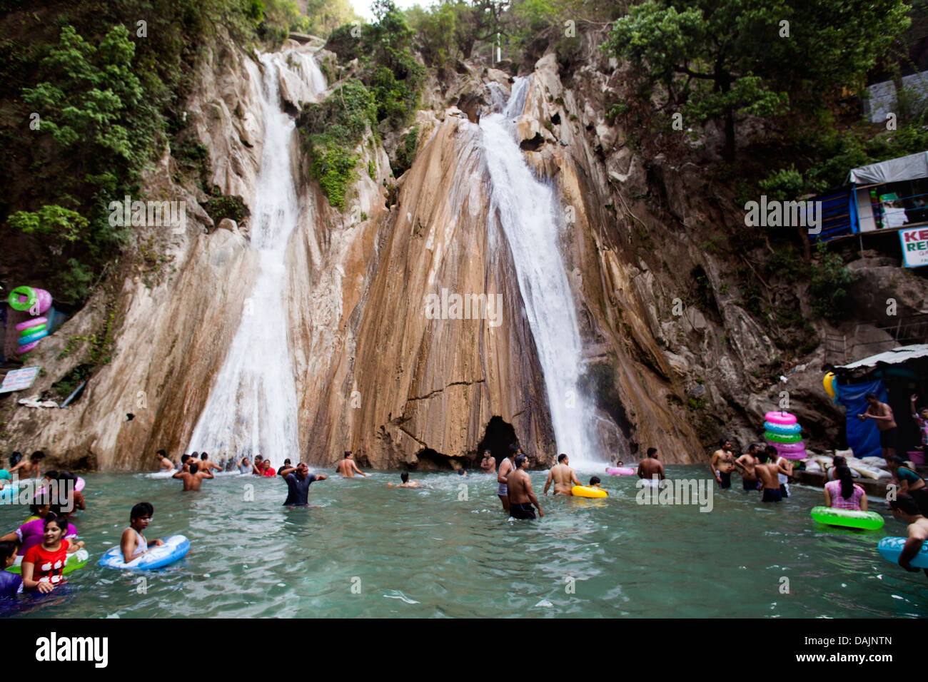 Tourists enjoying at waterfall, Kempty Falls, Chakrata Road, Mussoorie ...