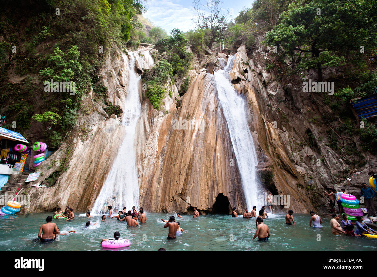 Tourists enjoying at waterfall, Kempty Falls, Chakrata Road, Mussoorie ...