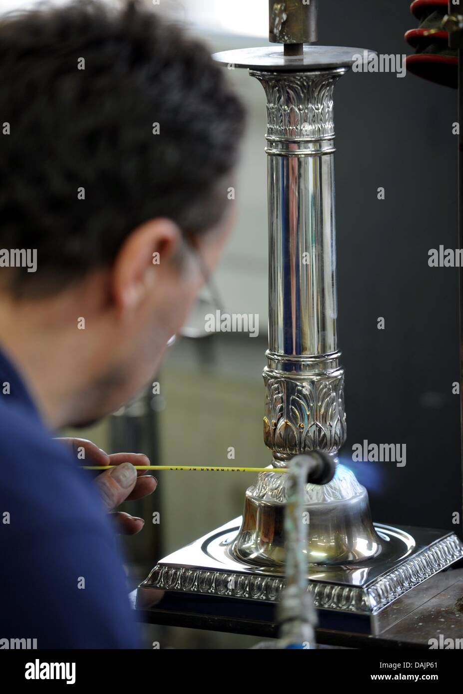 Robbe berking employee works on hi-res stock photography and images - Alamy