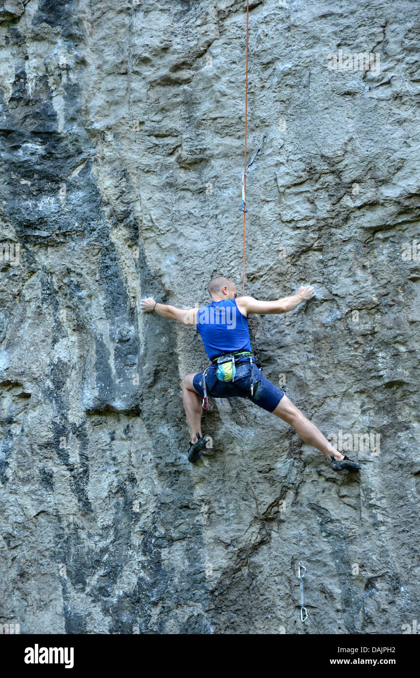 A man rock climbing in Miller's Dale, Derbyshire Stock Photo - Alamy