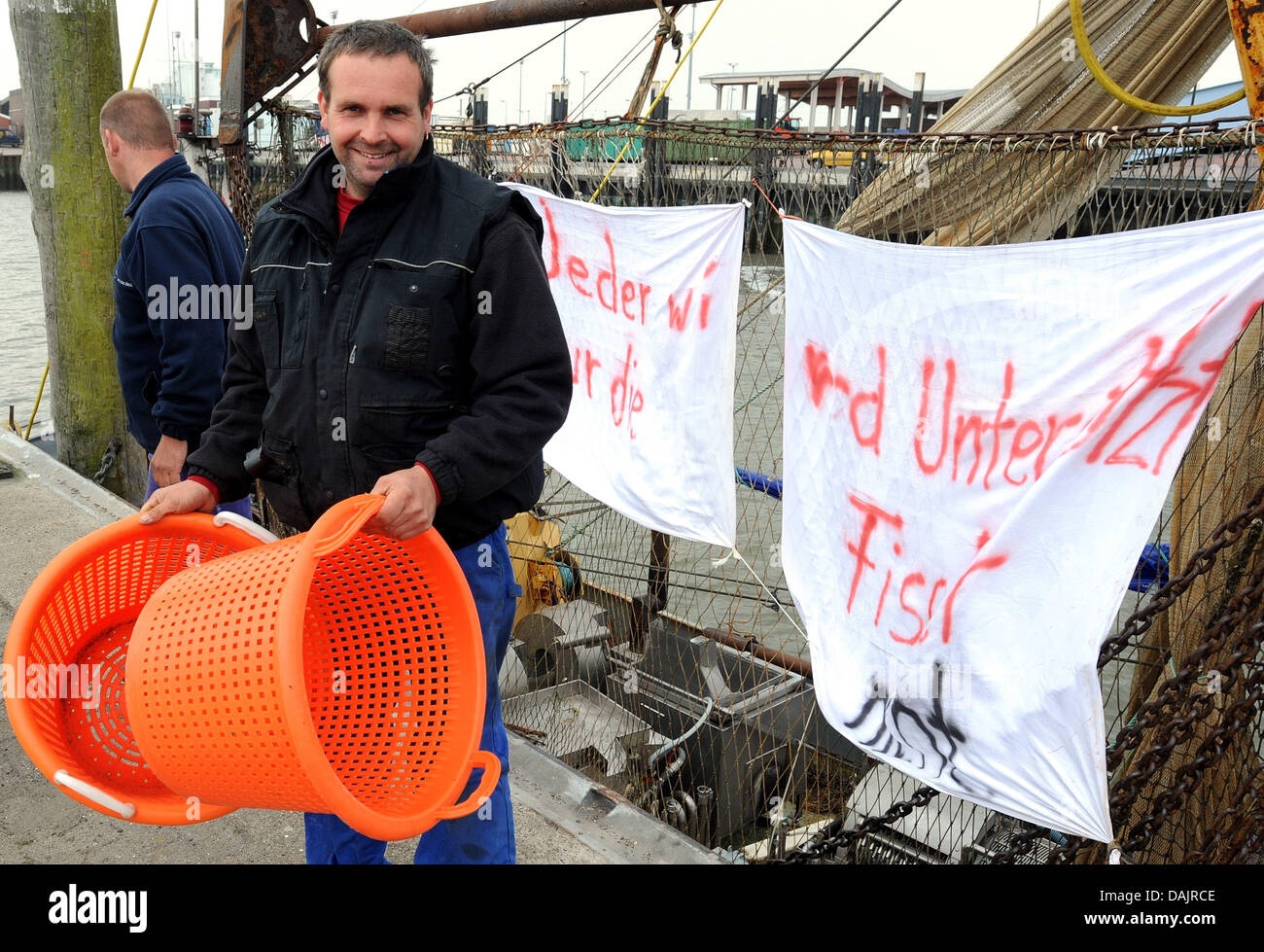 Fishers protest with empty baskets and banners against the pricing of ...