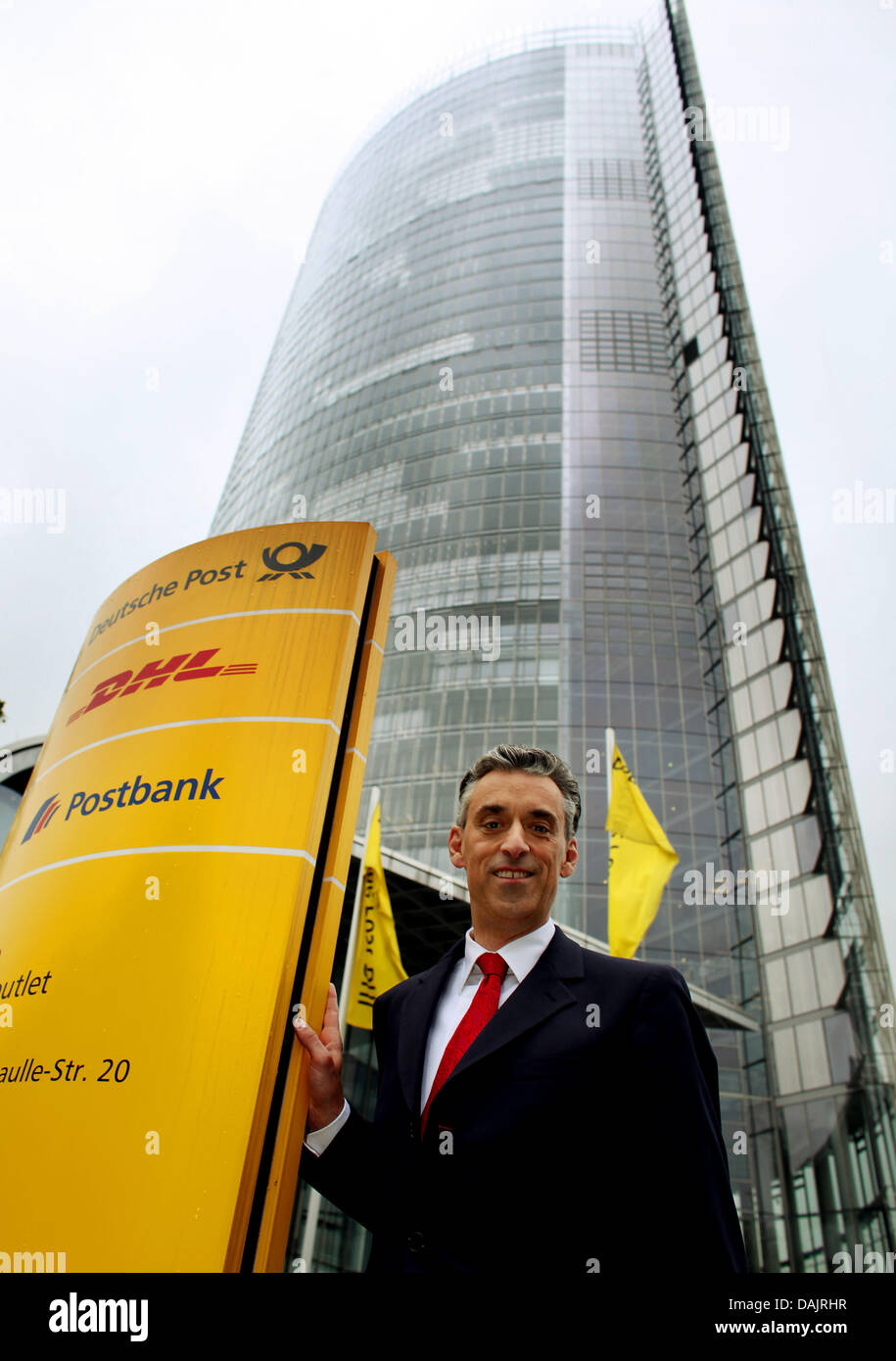 Deutsche Post and DHL CEO Frank Appel stands in front of the Deutsche ...