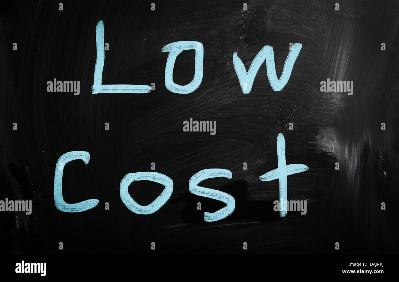 Low cost handwritten with white chalk on a blackboard Stock Photo - Alamy