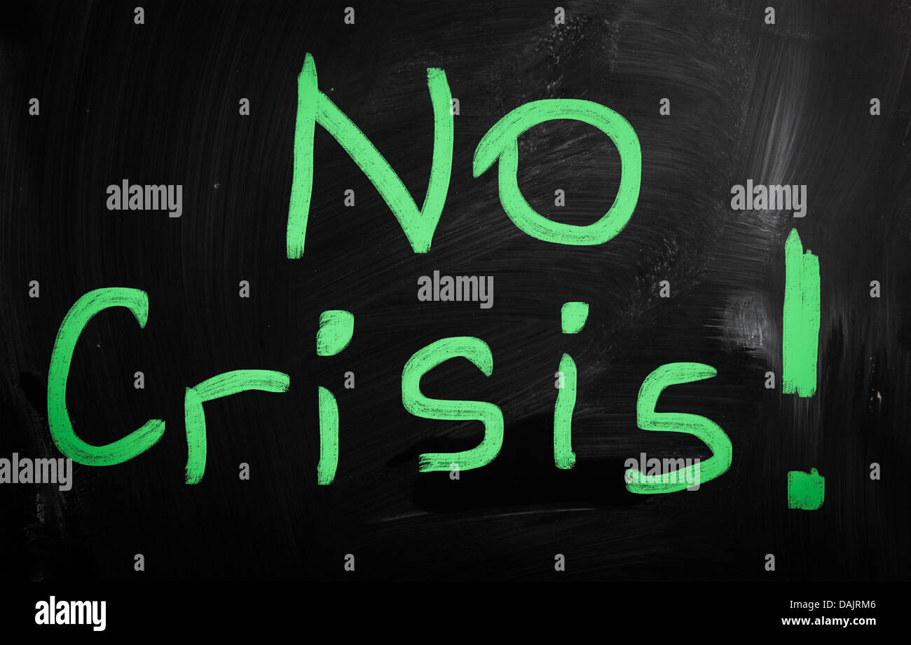 No crisis! handwritten with white chalk on a blackboard Stock Photo - Alamy