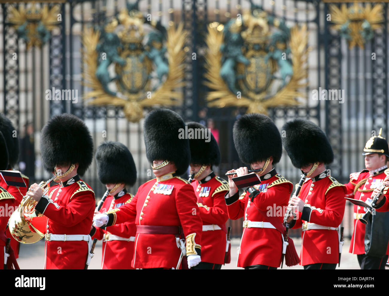 Soldiers leave Buckingham Palace during the guard changing parade in ...