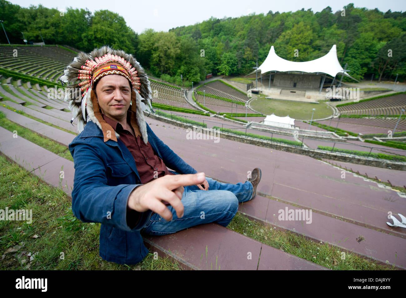 Comedian and singer Rainald Grebe greets like a Native American inside ...