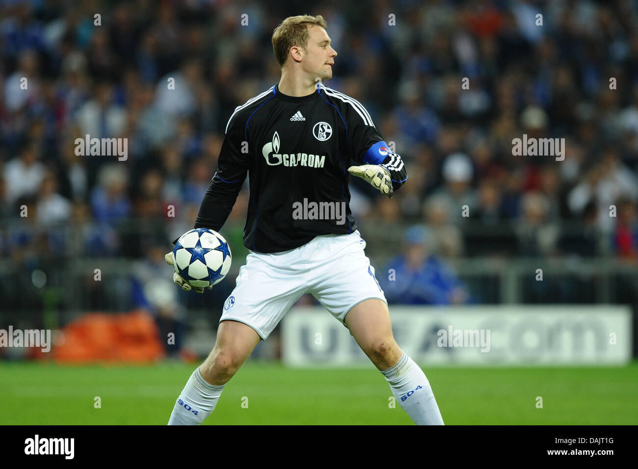 Schalke's Manuel Neuer throws the ball in the UEFA Champions League ...