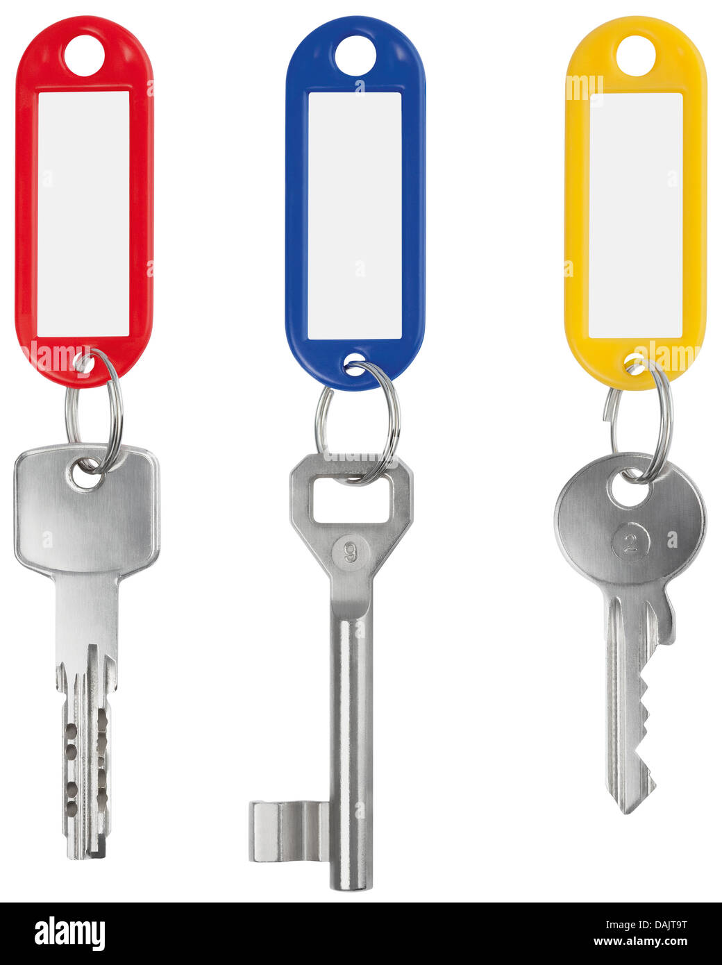 Keychain with three keys against white background, close up Stock Photo ...