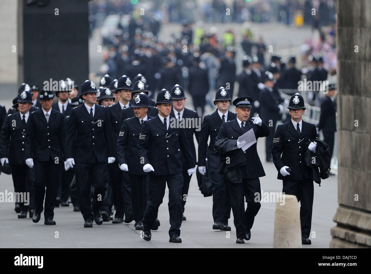 Policeman get ready for the wedding ceremony at Westminster Abbey in ...