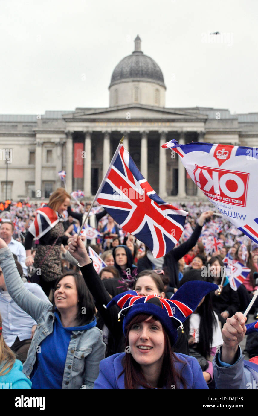 Royal fans pose during the run up to the royal wedding in London ...