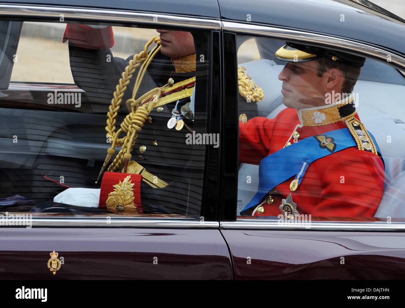 The groom Prince William (R) and his brother Prince Harry on their way ...