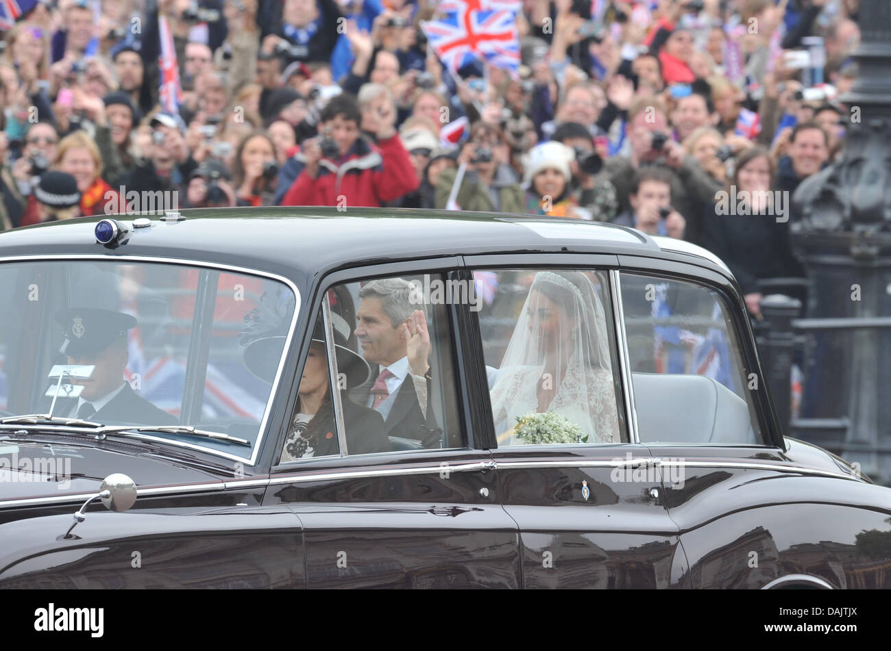 Kate Middleton (R) and her father Michael Middleton travel in a 1977 ...