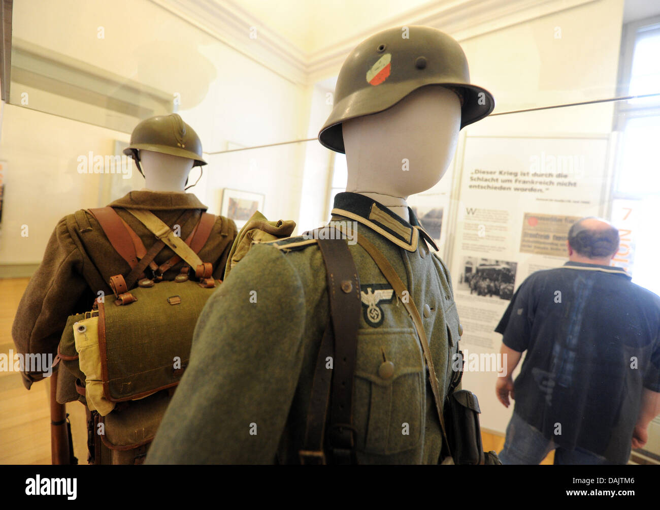 Mannequins dressed in the uniform of a French infantry officer (L) and ...