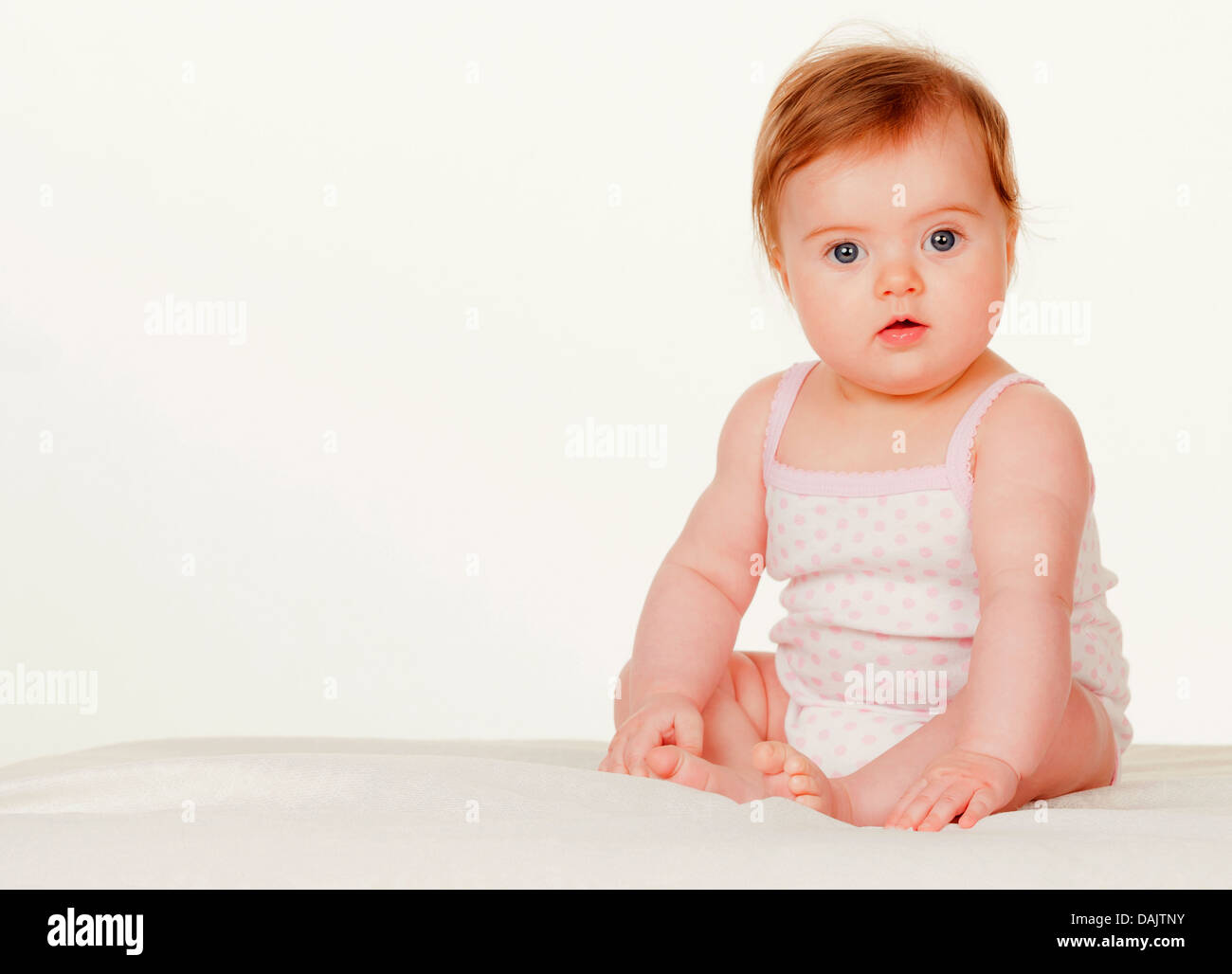 Close up baby sitting Cut Out Stock Images & Pictures - Alamy