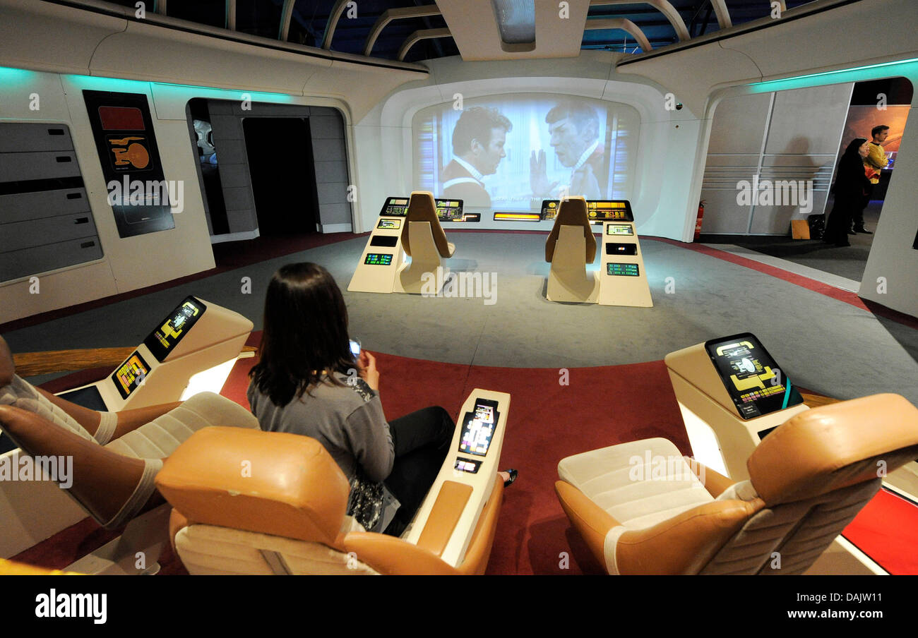 A staff member of the exhibition sits inside the head quarter of the ...
