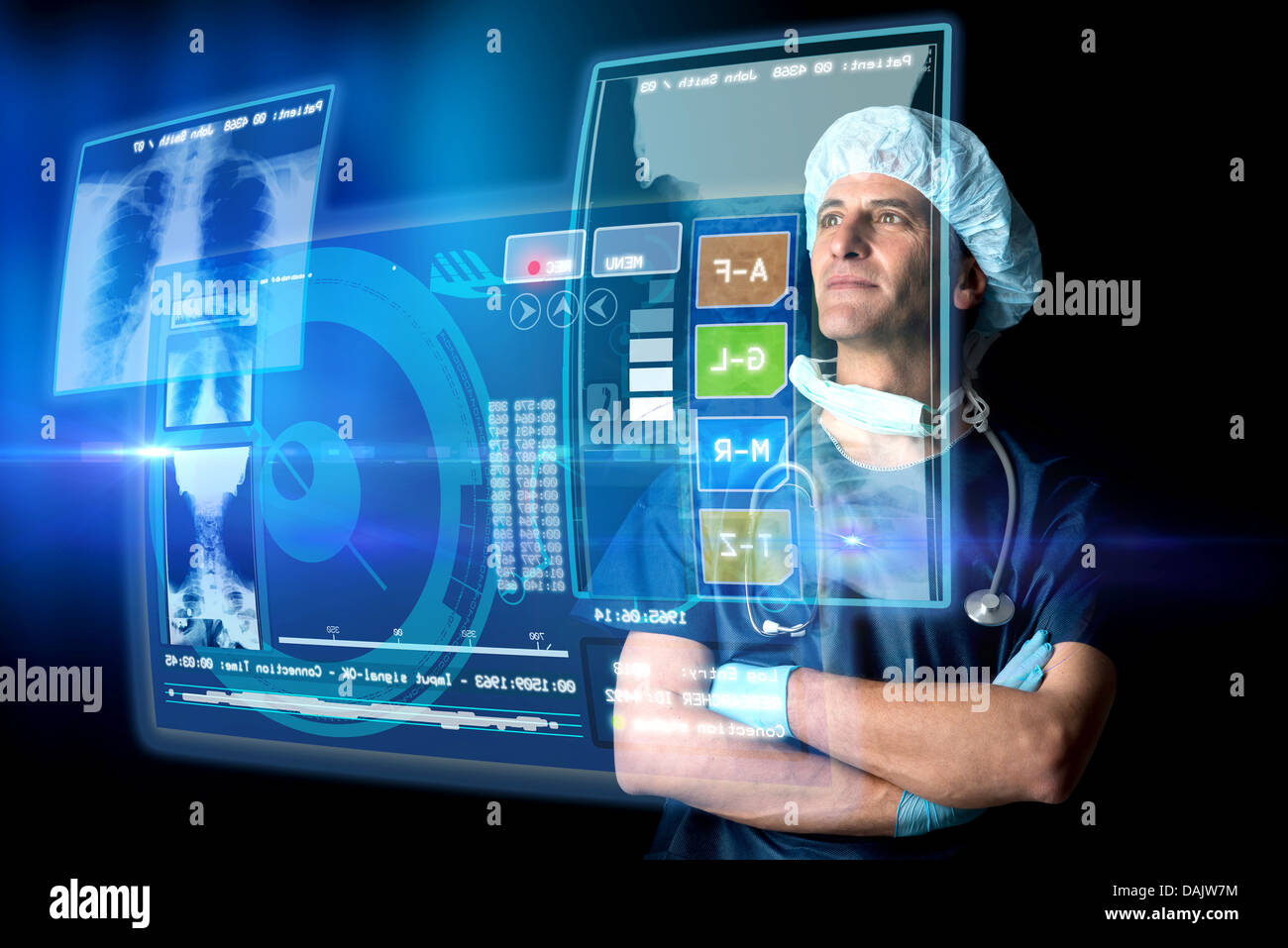 Doctor in uniform looking at screens Stock Photo - Alamy
