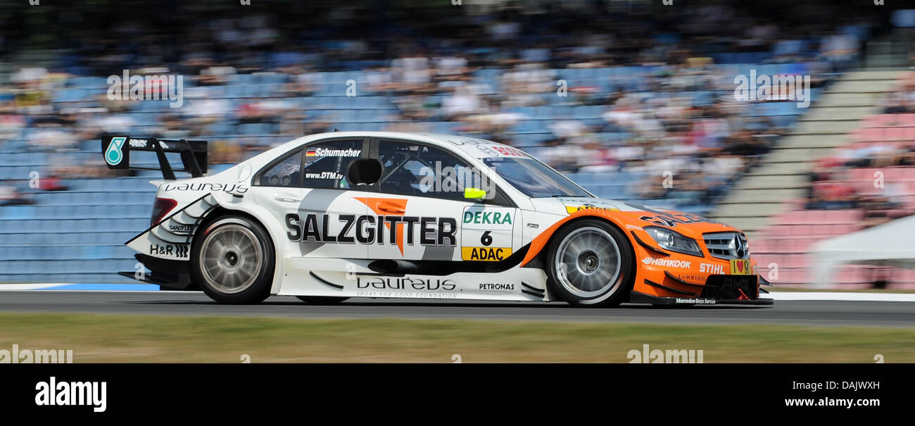 The German Ralf Schumacher, Team Mercedes, drives over the racing track ...